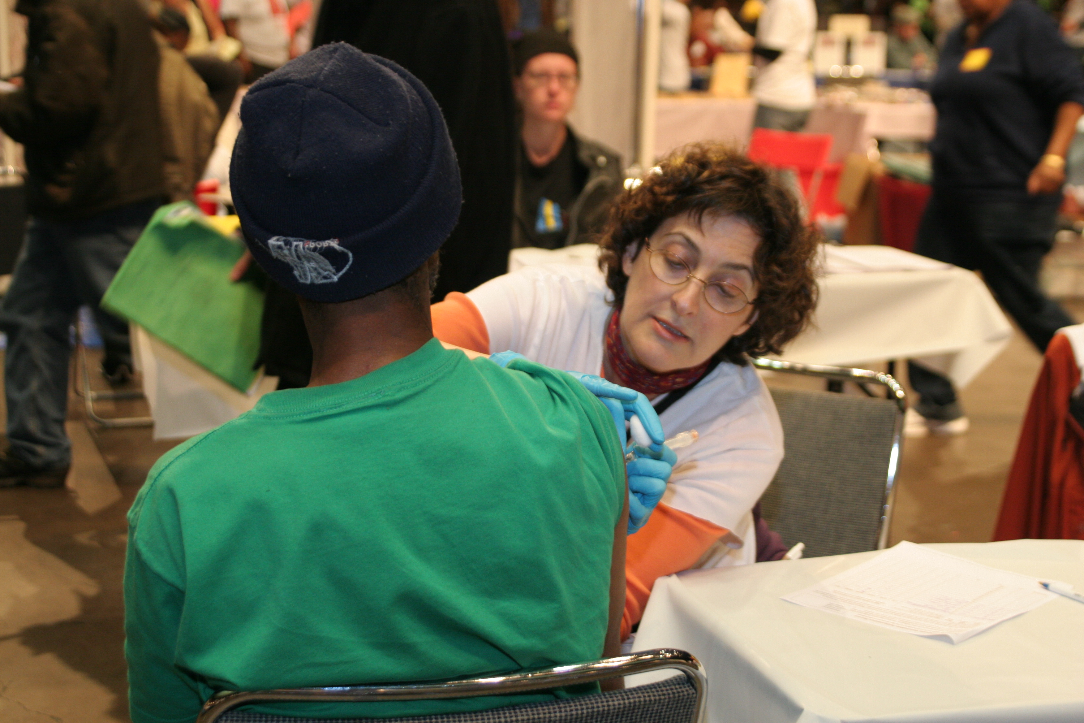 Participant receiving medical care - Project Homeless Connect